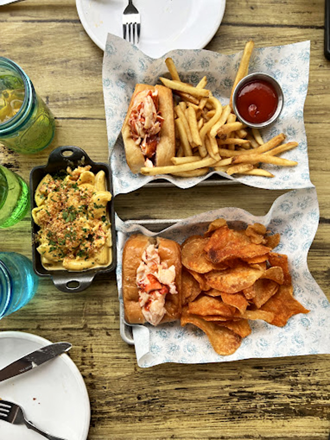 The Holy Trinity of lunch happiness: a perfectly overstuffed lobster roll, golden fries, and that moment when you realize you don't have to share.