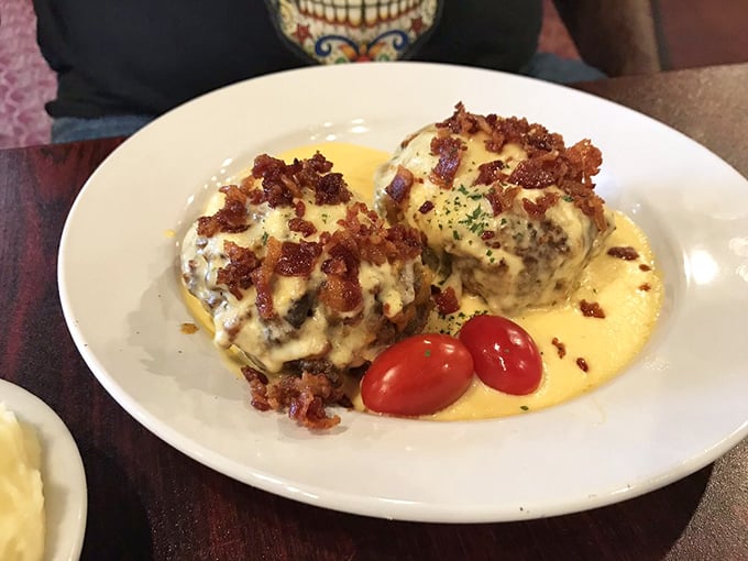 Meatloaf that doesn't just sit on the plate&mdash;it performs! Crowned with melted cheese and bacon bits, swimming in a sauce worth bottling.