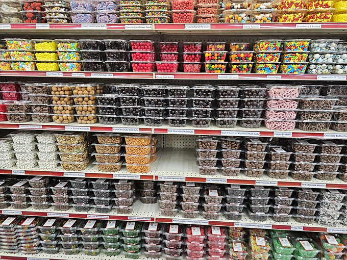 A kaleidoscope of chocolate-covered treasures in plastic containers &ndash; because nothing says "I'm an adult" like methodically selecting your own sugar coma.