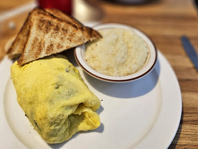 This omelet doesn't need Instagram filters &ndash; it's the real deal, fluffy and substantial, with a side of golden toast and grits.