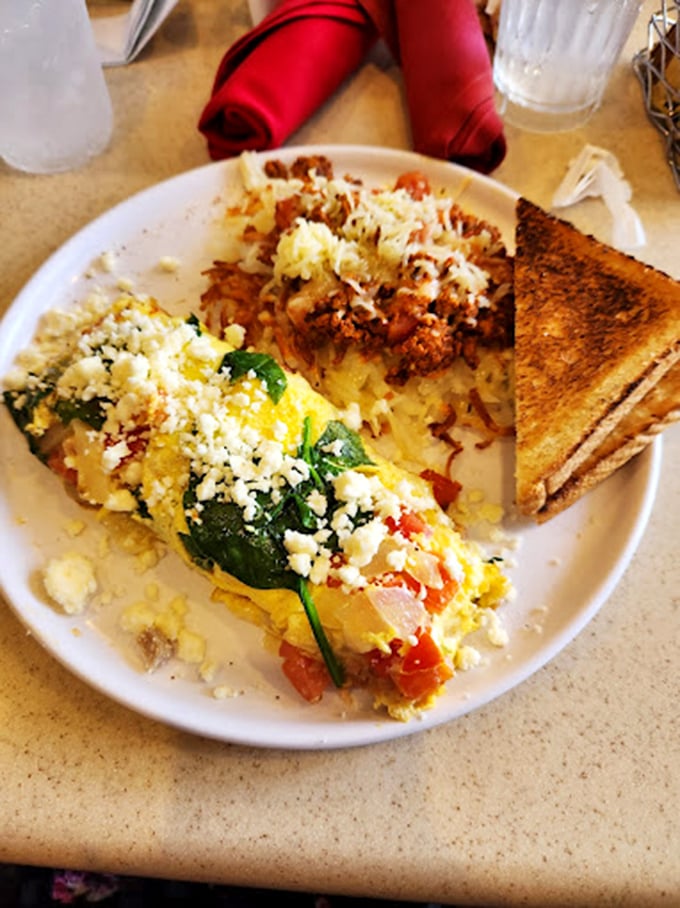 This isn't just an omelet; it's a morning masterpiece with perfectly melted cheese and vibrant veggies. Breakfast artistry at its finest.