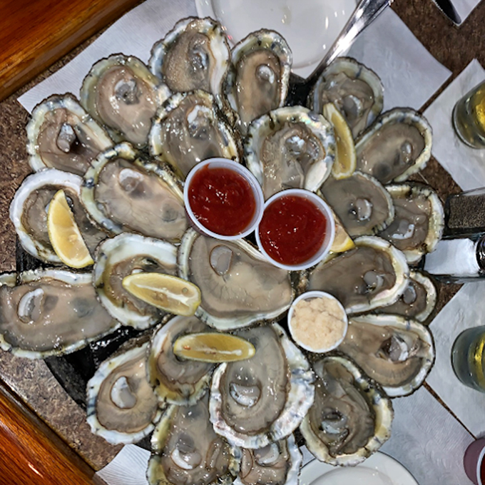 These oysters aren't just served; they're presented like oceanic jewels on a platter. The circular arrangement practically whispers, "Come sail away with me."