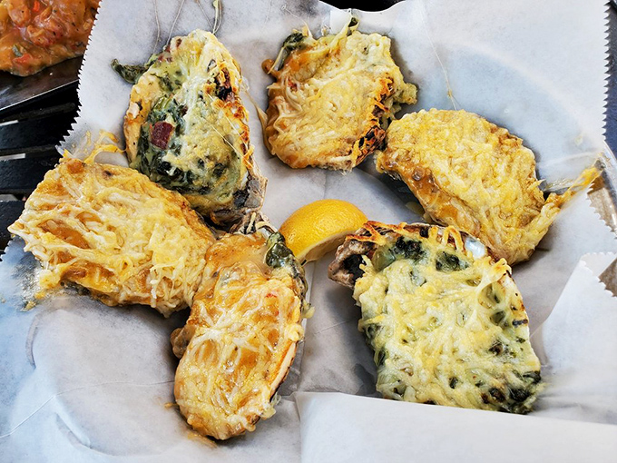 Baked, broiled, and beautiful – these oysters in all their golden glory are proof that sometimes playing with fire creates culinary magic.