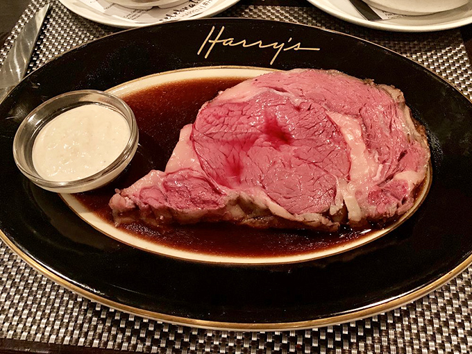 Behold the star of the show: prime rib so perfectly pink it makes other steakhouses weep with jealousy. That horseradish sauce is the sidekick every beef hero needs.