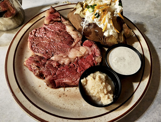 Prime rib that doesn't need a filter to look this good. The kind of beef that makes conversation stop mid-sentence when it arrives at your table.
