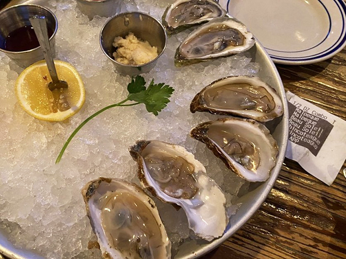 These oysters aren't just served; they're presented like jewelry on a bed of ice, with accompaniments standing by like loyal courtiers.