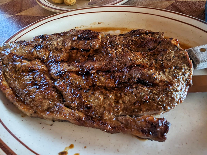 This isn't just a steak&mdash;it's edible poetry with a perfect sear. The kind of ribeye that makes conversation stop and eyes close in reverence.