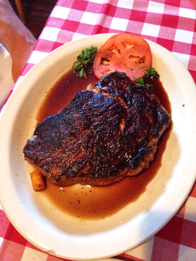 This perfectly seasoned ribeye isn't trying to impress with fancy garnishes&mdash;it delivers pure, unadulterated flavor that makes vegetarians question their life choices.