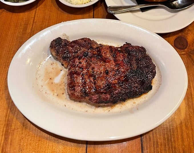This ribeye isn't just cooked, it's been transformed&mdash;the perfect char telling stories of flame and patience.