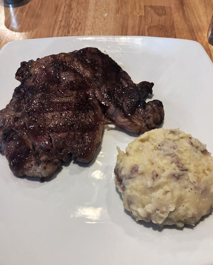 This isn't just a ribeye&mdash;it's a masterclass in steak preparation, with a perfectly caramelized exterior giving way to juicy, flavorful meat within.