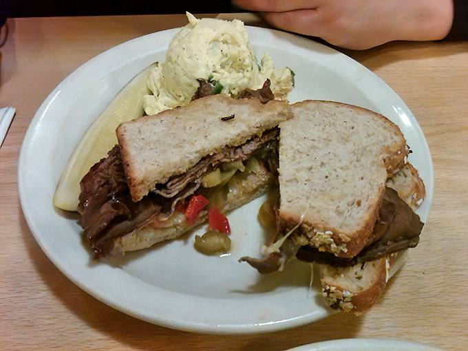 This isn't just a sandwich; it's architecture with purpose. Every layer thoughtfully constructed for that perfect bite of deli heaven.