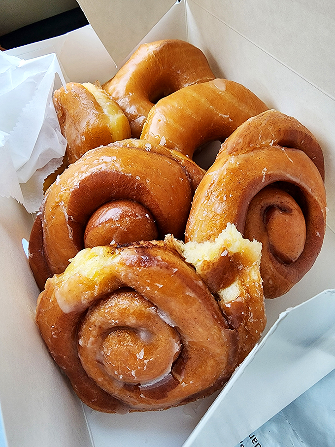 These cinnamon rolls aren't just breakfast, they're an architectural marvel of swirled perfection that would make Frank Lloyd Wright weep with joy.