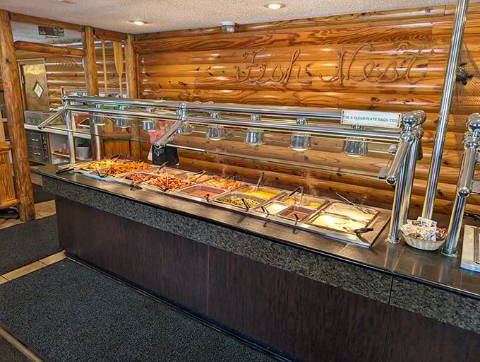 The buffet stretches like a golden horizon of possibility. Each tray promises a different delicious journey for your taste buds.