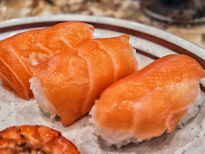 These salmon nigiri aren't just sushi &ndash; they're glistening jewels of the sea, perfectly portioned and waiting to transport you to coastal Japan.