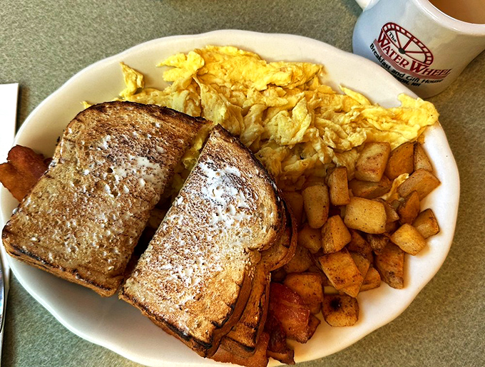 Breakfast perfection doesn't need to be complicated. Golden toast, fluffy scrambled eggs, and home fries that could make a potato proud.