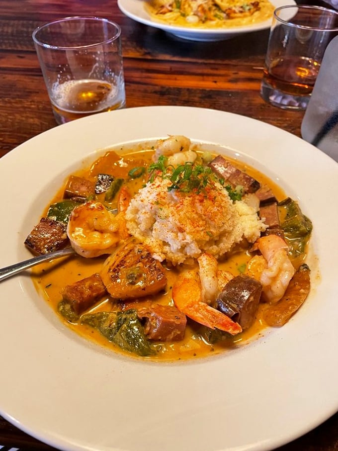 Behold the star of the show! Plump shrimp and creamy grits swim in a sauce so good, you'll contemplate drinking it when nobody's looking.