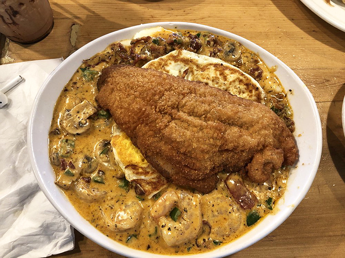 Southern fusion at its finest&mdash;crispy catfish crowning creamy shrimp and grits. It's the culinary equivalent of hitting the lottery twice.