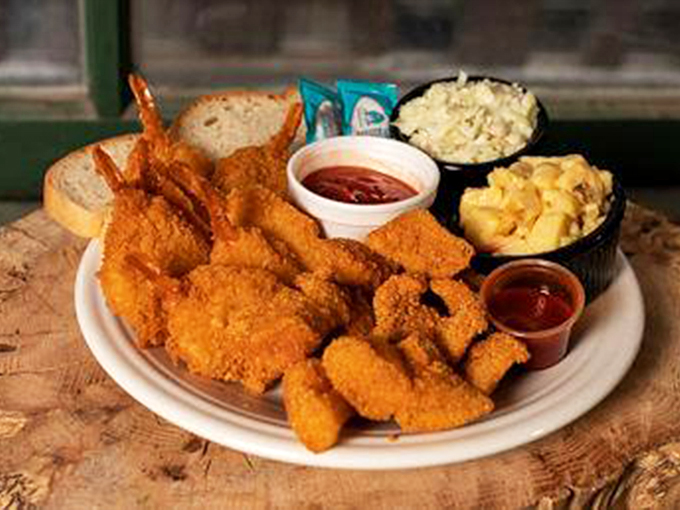 This isn't just a plate&mdash;it's an edible treasure map where X marks the spot for golden shrimp, creamy sides, and seafood that makes landlocked diners weep with joy.