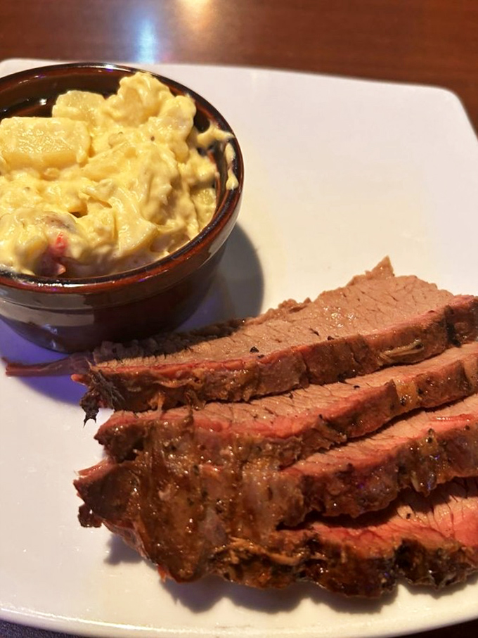 Brisket sliced to perfection alongside creamy mac and cheese&mdash;a partnership more harmonious than Simon and Garfunkel in their prime.
