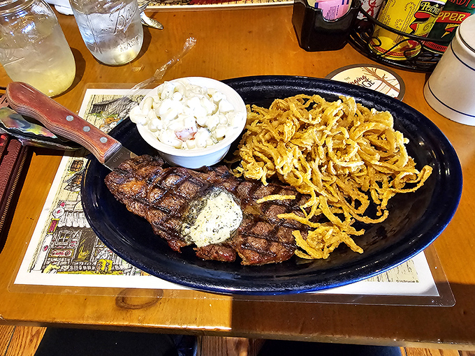 This isn't just a steak&mdash;it's a masterpiece of mountain cooking. That herb butter melting on top is performing culinary magic before your eyes.
