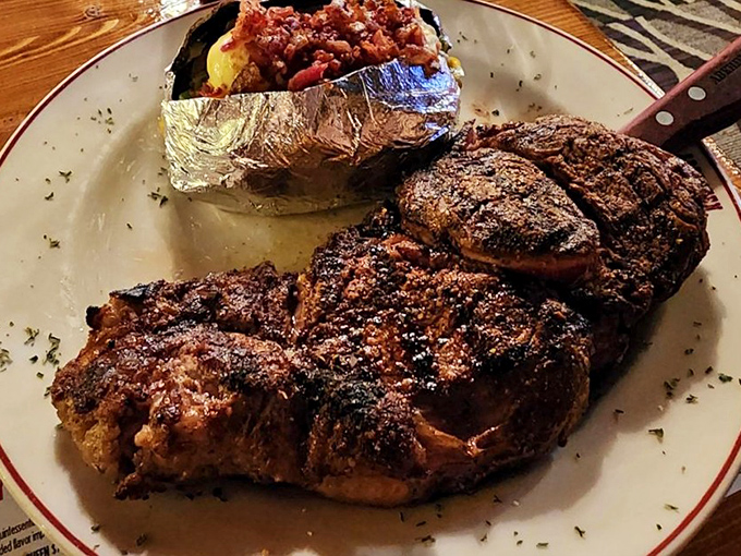 This isn't just a steak&mdash;it's a declaration of independence from trendy food fads, complete with a loaded baked potato standing guard.