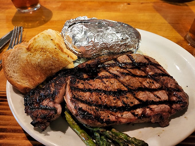 This isn't just a steak; it's a masterpiece of timing and technique, complete with perfect grill marks that whisper, "I know what I'm doing."