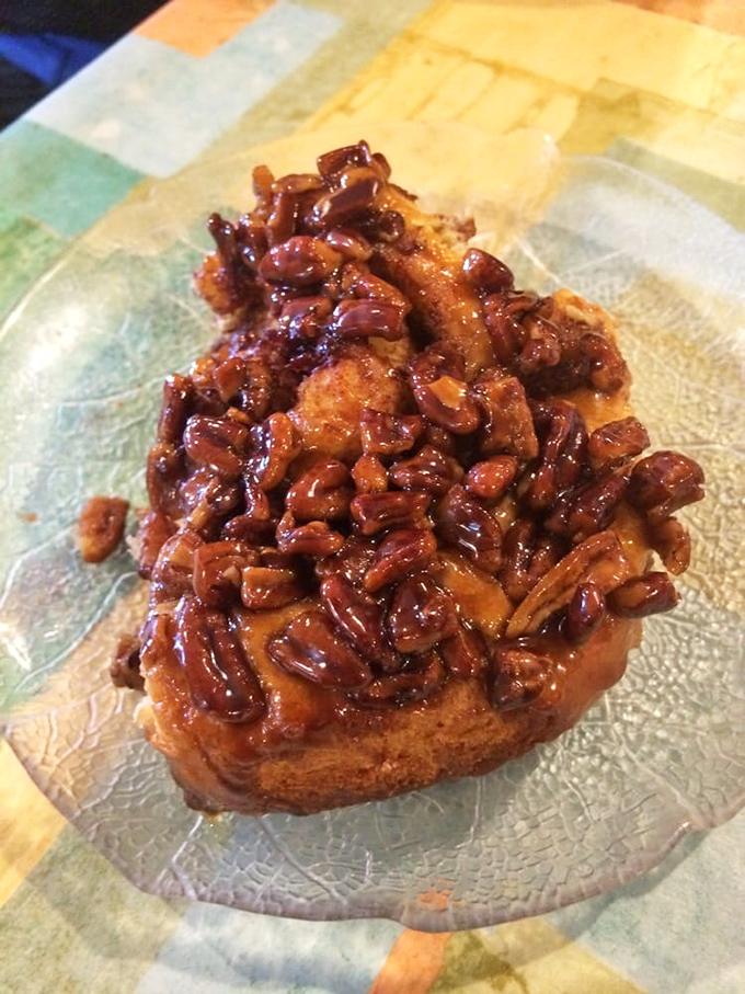 Behold the sticky bun in its natural habitat&mdash;glistening with caramel, studded with pecans, and absolutely no regard for your diet plans.