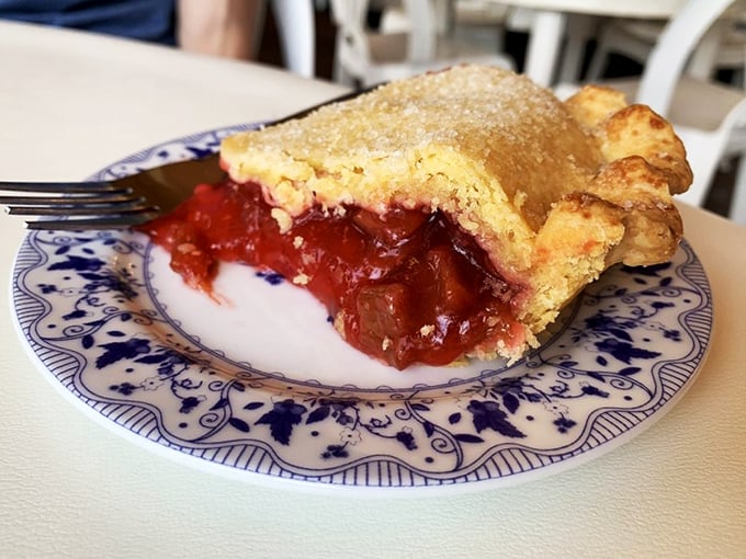 The ruby-red filling of this strawberry rhubarb slice peeks out like a sweet secret. That perfect balance of tart and sweet might just ruin all other pies for you.
