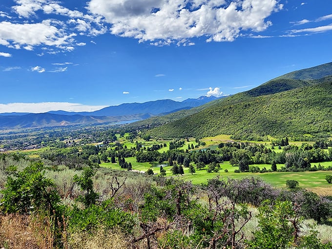 From this vantage point, Heber Valley unfolds like a patchwork quilt your grandmother would approve of—orderly, beautiful, and impossibly green.