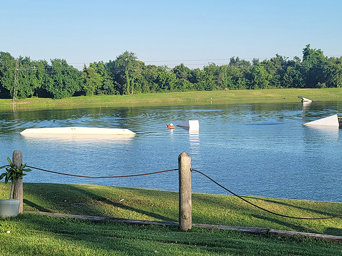 Tranquility before the chaos. The calm water surface belies the afternoon of spectacular wipeouts and triumphant victories that await.