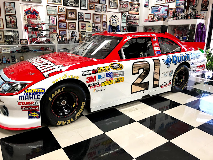 Modern NASCAR meets meticulous presentation on this checkered floor. The #21 Motorcraft racing machine looks ready to peel out at any moment.
