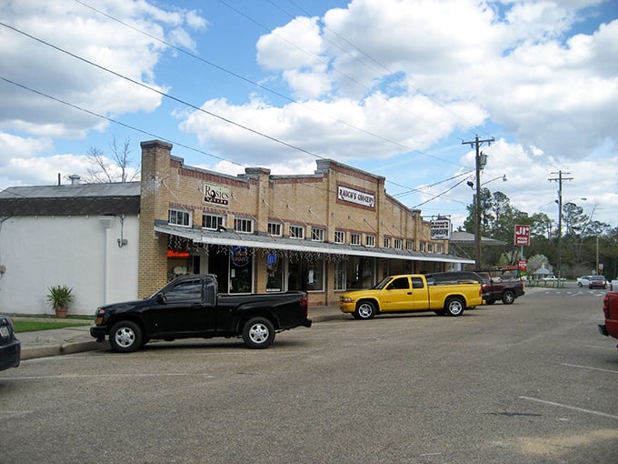 Abita Springs Farmers Market welcomes visitors through its storybook arch - like entering a fairytale where the happy ending involves fresh produce.
