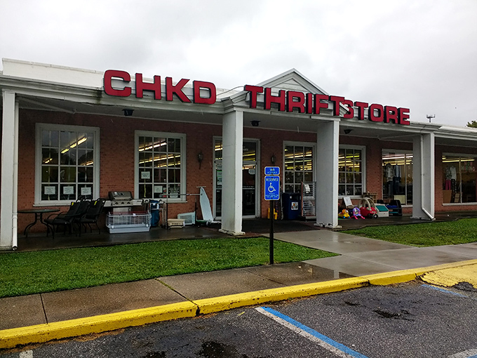 CHKD's distinctive red signage promises a thrifting experience that benefits kids while satisfying your need for vintage pyrex and barely-worn blazers.