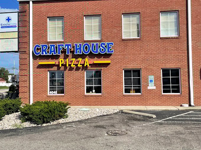 Craft House Pizza's brick building stands like a temple to the art of perfect crust and thoughtful toppings.