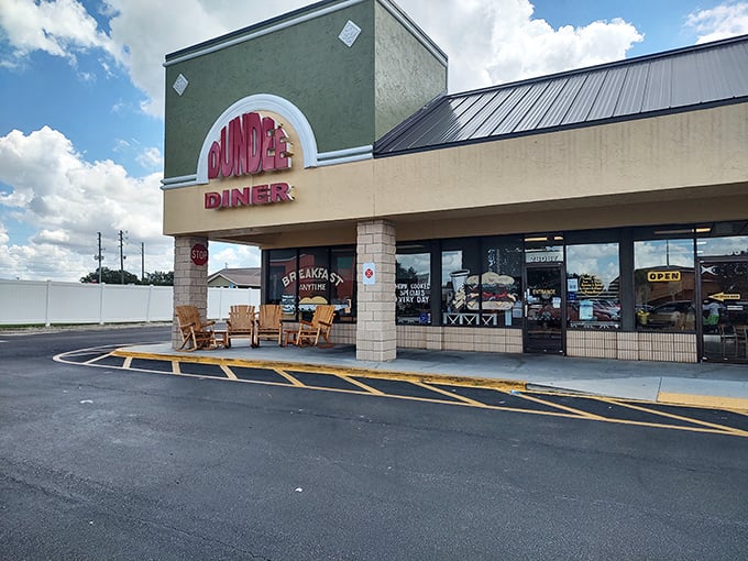 Dundee Diner's inviting facade features wooden rocking chairs that whisper, "Sit a spell before you feast &ndash; you'll need the rest afterward."