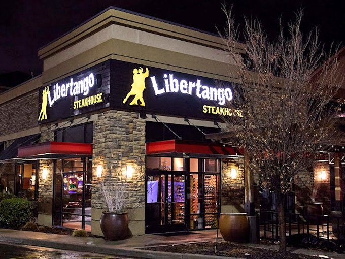 Tango with your taste buds! Libertango's stone facade and dramatic lighting hint at the Argentinian beef adventure waiting inside.