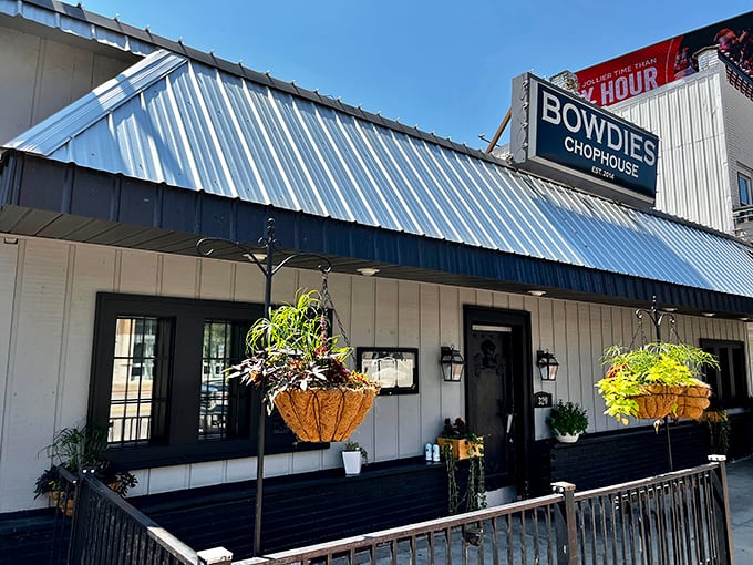 White siding and a metal roof? Bowdie's modest appearance is the ultimate culinary misdirection for steak lovers.