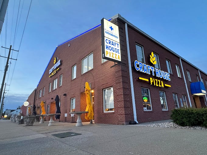 The evening glow around Craft House hints at the warm, cheesy treasures waiting inside.