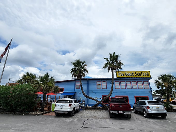 Palm trees frame DeSoto's Seafood Kitchen like nature's exclamation points, emphasizing that something special happens inside those blue walls.