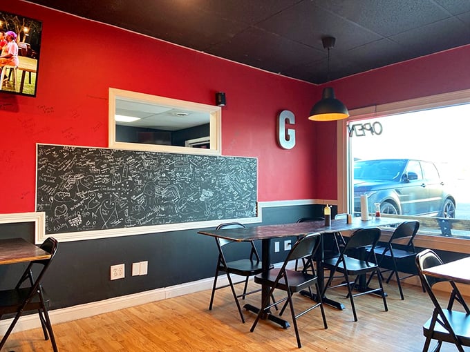 The chalkboard wall at Grill't invites creativity while the red walls signal the passion behind their smoke-kissed creations.