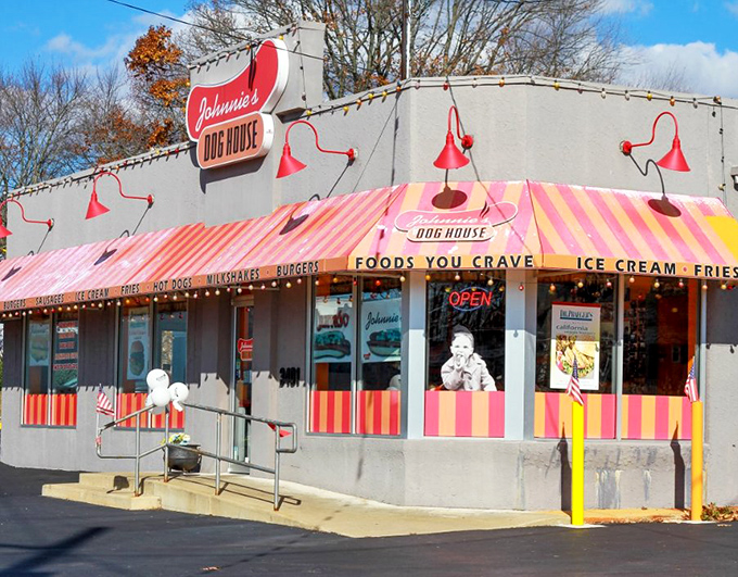 The striped awning at Johnnie's promises more than shelter&mdash;it's a colorful gateway to flavor country.