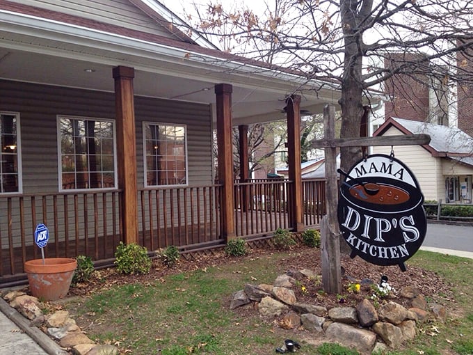 Mama Dip's Kitchen sign and entrance: The wooden sign might as well read "Abandon Diets, All Ye Who Enter Here"&mdash;a portal to fried chicken nirvana.