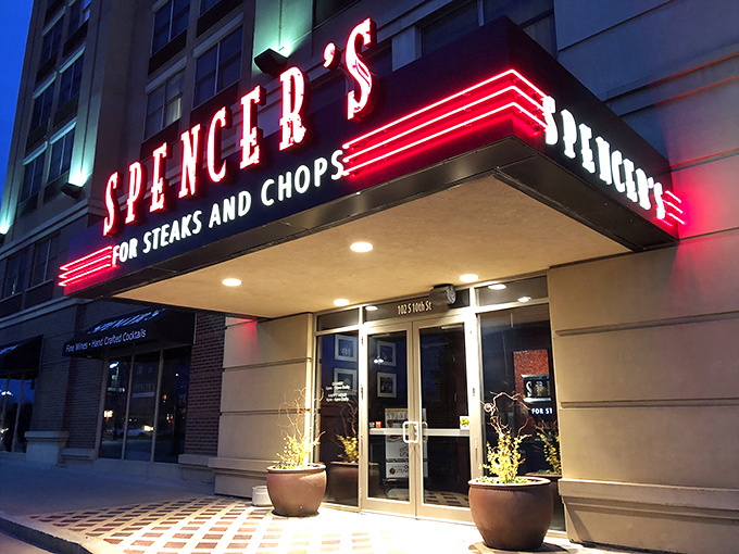 Urban sophistication meets Midwestern meat mastery at Spencer's, where the sidewalk entrance promises a prime experience inside.