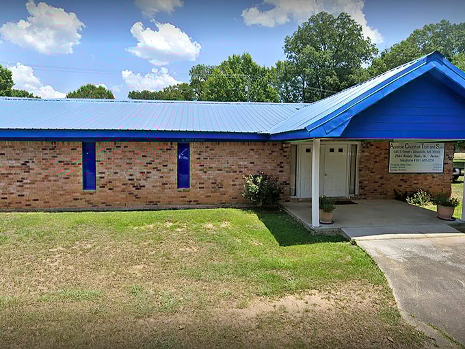 Small town values meet practical architecture at this community church, where the blue roof stands out against Mississippi's summer sky.