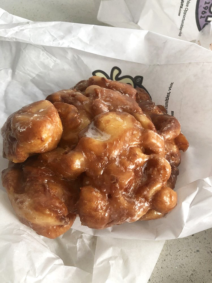 Behold the topography of happiness: peaks and valleys of fried dough, apple chunks, and glaze that would make cartographers weep with joy.