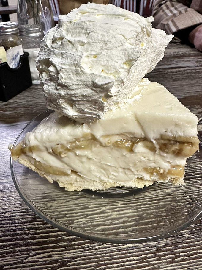 Banana cream pie with a meringue topping so tall it needs its own zip code. This is engineering and dessert in perfect harmony.