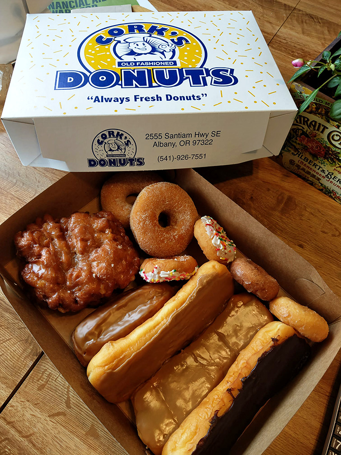 The white box says "Always Fresh Donuts," but that apple fritter is screaming "I'm about to change your definition of breakfast perfection."