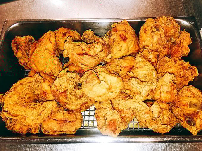 A tray of chicken so perfectly fried, it could make Colonel Sanders hang his head in shame and rethink his life choices.