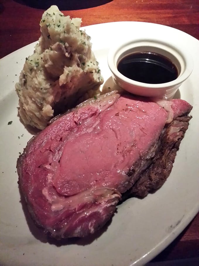 Pink perfection that doesn't need Instagram filters. The prime rib's marbling tells you everything you need to know about the flavor journey ahead.