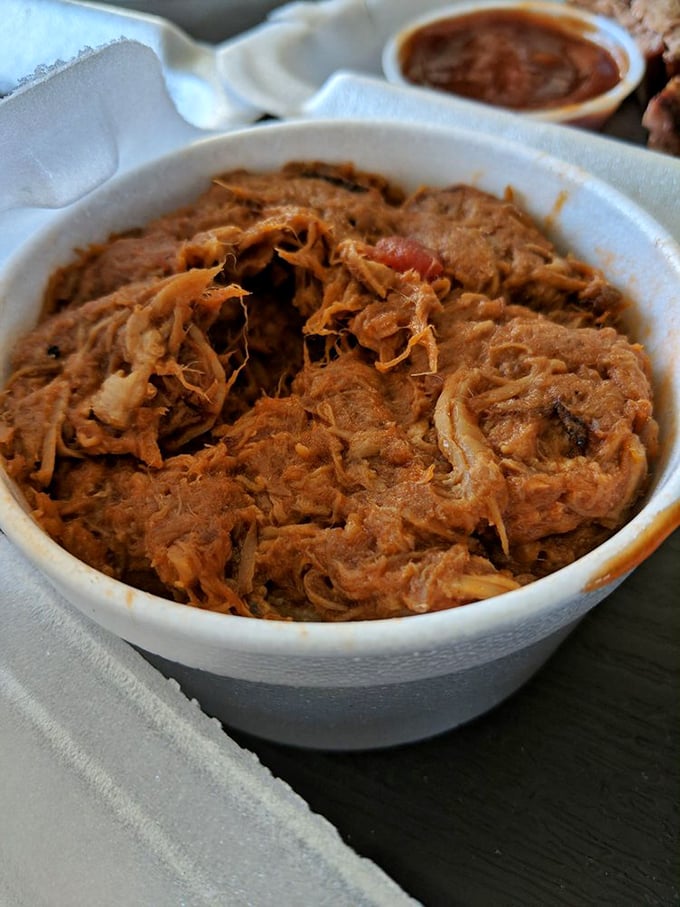 Tender strands of pink-tinged pork that collapse at the mere suggestion of a fork &ndash; barbecue nirvana found in a humble bowl.